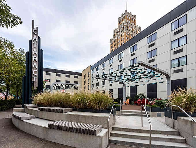 The Cataract sign marks downtown Niagara Falls where modern development meets the roar of nature's most spectacular water show nearby.