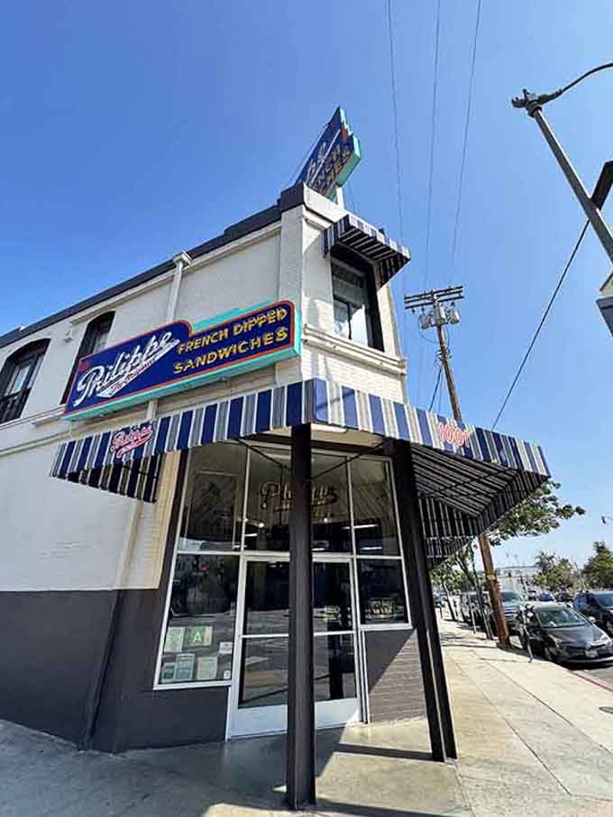 That iconic blue and white striped awning has been attracting French dip lovers for generations of hungry Angelenos.