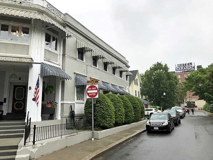 Crisp white awnings and manicured hedges show a town that takes pride in looking its absolute Sunday best.