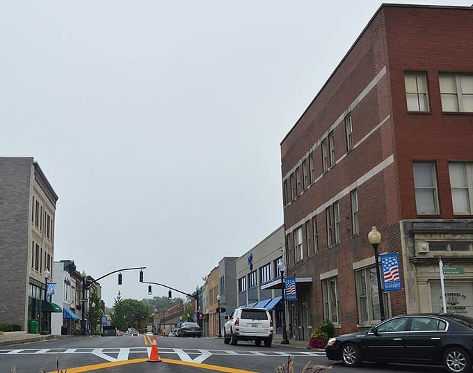 Wide streets and solid buildings reflect a town built to last through generations of change and growth.