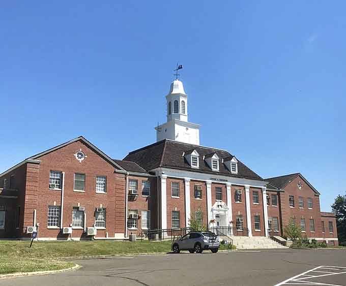 The bell tower tops this sprawling municipal building like a cherry on top of a very official sundae.