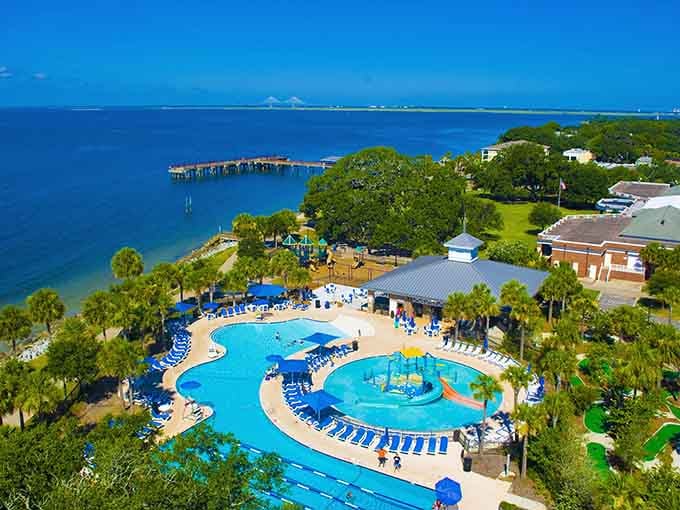 Crystal blue pools meet emerald waters where palm trees sway and retirement dreams become sun-soaked reality.