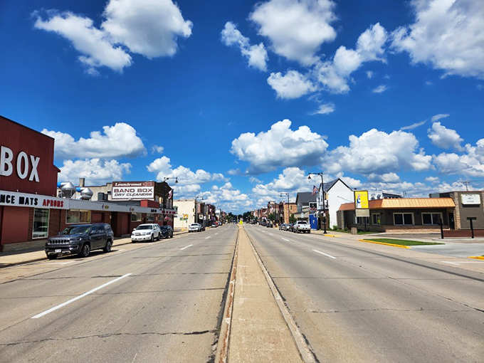 Blue skies highlight a main street where every storefront tells a story of community resilience and local pride.
