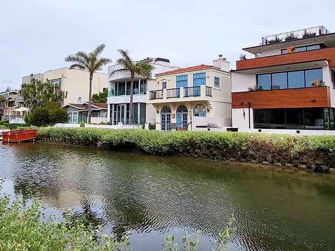 Modern architecture meets natural beauty where canal-side homes showcase their unique personalities through bold design choices.
