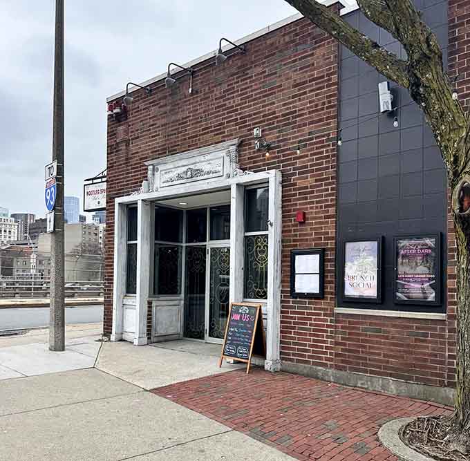 That ornate entrance isn't fooling anyone, this speakeasy-style facade hides Boston's most surprising seafood adventure inside.