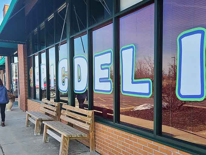 Even the windows get the pop culture treatment, turning ordinary glass into a billboard for nostalgia and good times ahead.