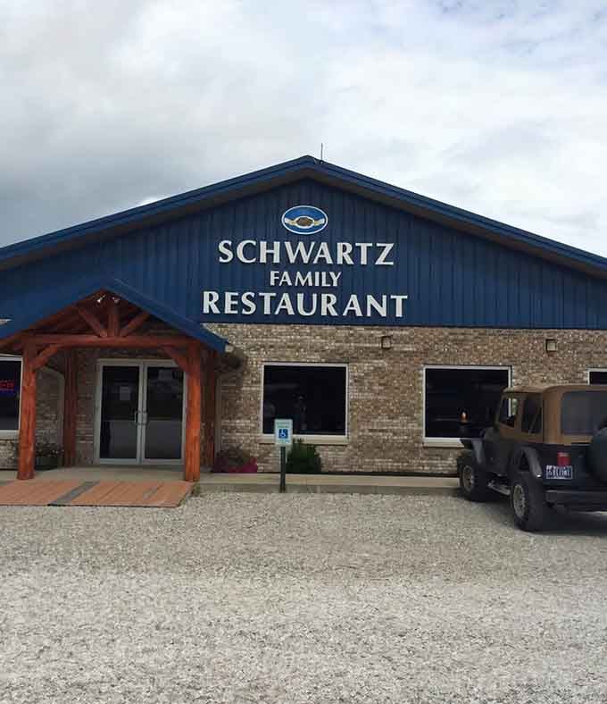 That blue metal roof and stone facade might look humble, but inside awaits scratch-made magic worth every mile.