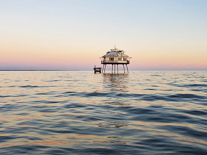 When the sky blushes pink and the bay goes glass-smooth, magic happens around those stilts.