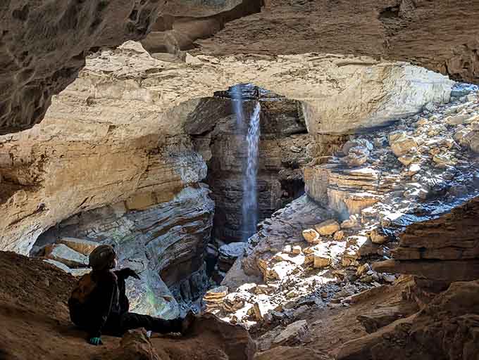 The limestone layers tell millions of years of history while that waterfall steals the show completely.