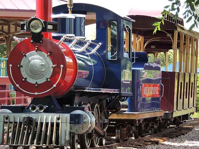 The train cars stretch out like a promise of simple pleasures, waiting to carry you through desert scenery at the perfect pace.