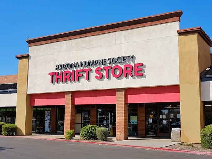 That cheerful storefront with its bold pink lettering promises treasures inside where shopping helps save furry lives.