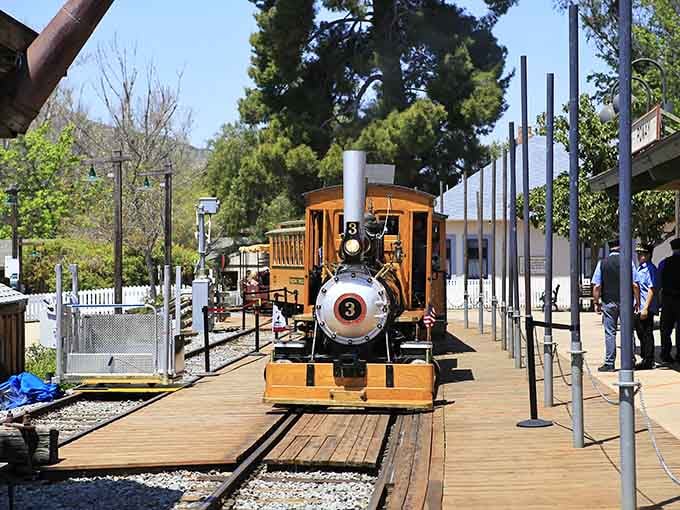 That gleaming yellow locomotive isn't just for show—it's your ticket to a simpler, more charming era.