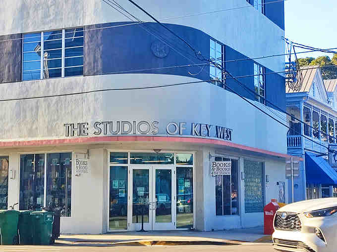 That curved corner entrance welcomes book lovers like a warm hug from your favorite librarian who actually gets you.
