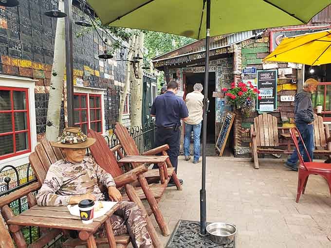 The outdoor seating situation here is peak Colorado: wooden chairs, mountain air, and coffee worth the wait.