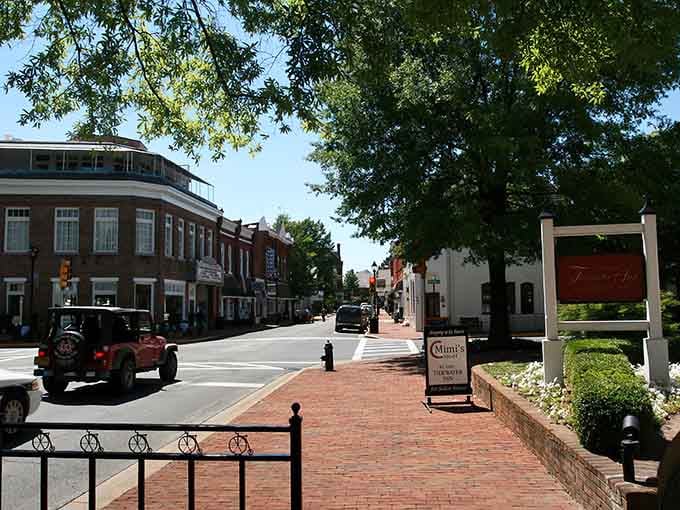 Brick sidewalks and tree-shaded streets where the biggest decision is which charming storefront to explore first.