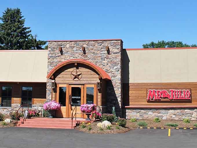 That arched entrance and stonework facade promise something special, like finding a hacienda in the heartland.