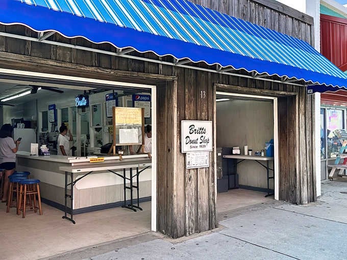 That blue-striped awning has been beckoning donut lovers since before your parents' first date at the beach.