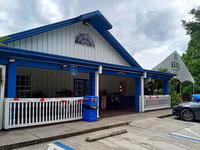 That charming blue and white exterior promises fruit wines and farm fun, not your typical Napa pretensions.