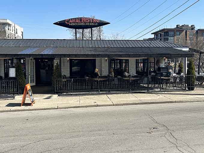 That distinctive sign and charming exterior promise something special waiting inside along the Indianapolis Canal Walk.