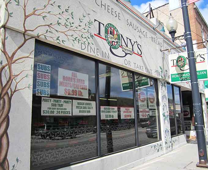 That storefront mural isn't just decoration; it's a promise of the carb-loaded, meat-stacked adventure waiting inside for you.