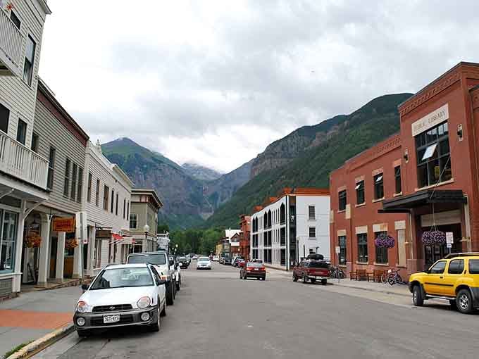 Mountains framing Main Street like nature's own picture frame, proving Colorado doesn't do anything halfway.