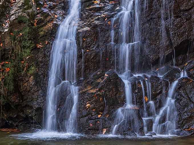 Water tumbles over moss-draped rocks like nature's own fountain show, proving Maryland has serious scenic game.