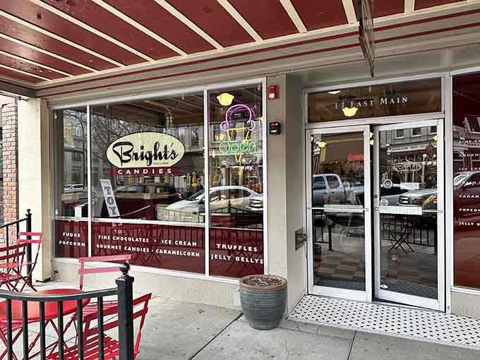 That red-and-white striped awning isn't just charming, it's basically a beacon calling all sugar lovers to paradise.
