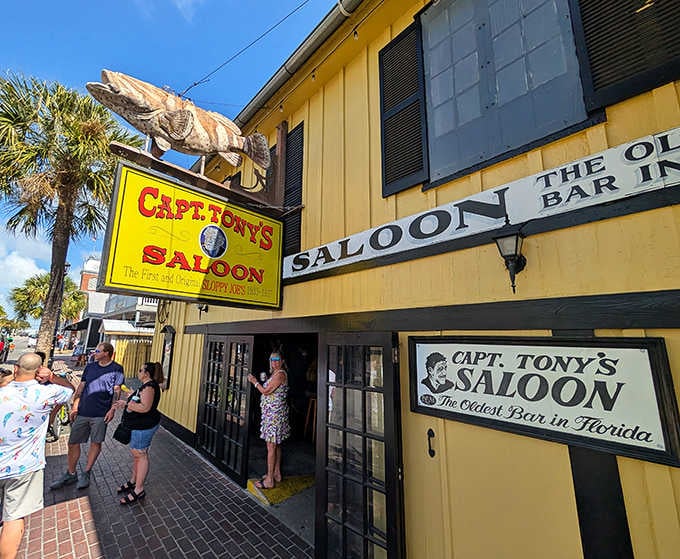 That bright yellow exterior isn't just a building, it's a beacon calling you to Florida's oldest watering hole.