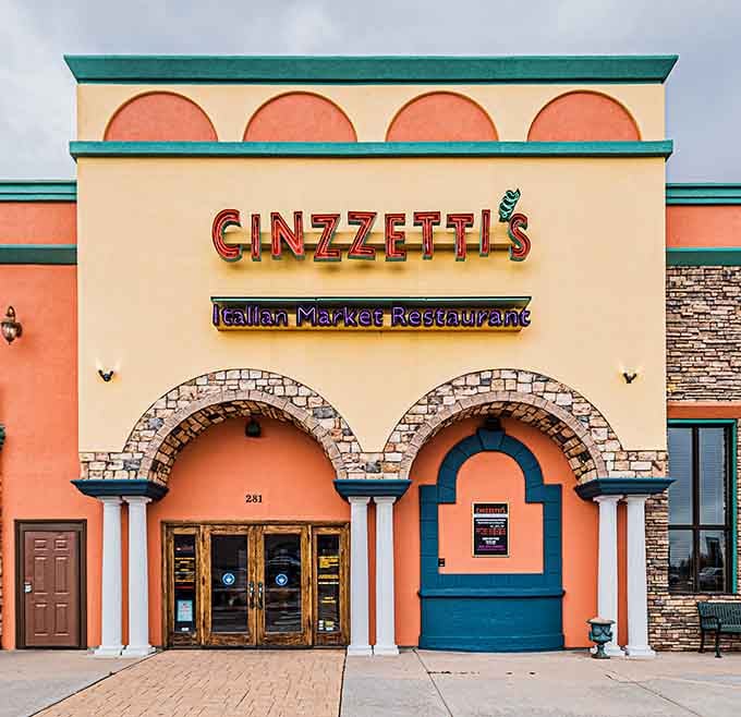 That colorful facade practically sings "Come mangia!" with architectural flair that transforms suburban Northglenn into a Mediterranean daydream.