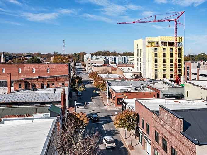 Downtown Greenville's skyline shows a city on the rise, where cranes signal growth that hasn't forgotten its charm.