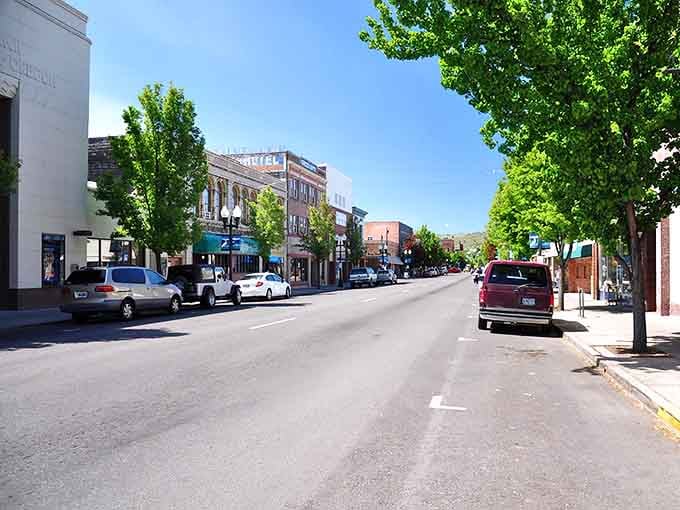 Tree-lined streets and historic storefronts create a downtown that feels refreshingly real, not manufactured.