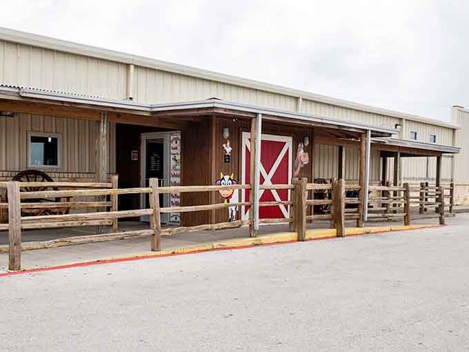 That rustic barn-style entrance promises serious country cooking, and those wooden corrals aren't just for show.
