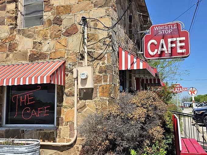 That weathered stone and those candy-striped awnings whisper stories older than your favorite pair of jeans.