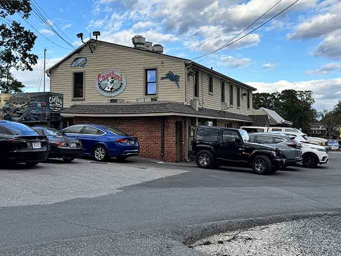 The tan siding and brick foundation might not scream "culinary destination," but that packed parking lot tells the real story.
