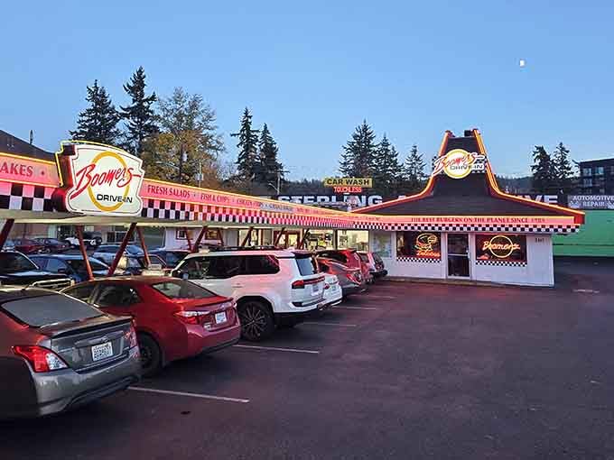 That pink and white exterior isn't whispering its presence, it's singing a full-throated doo-wop anthem to your hunger.