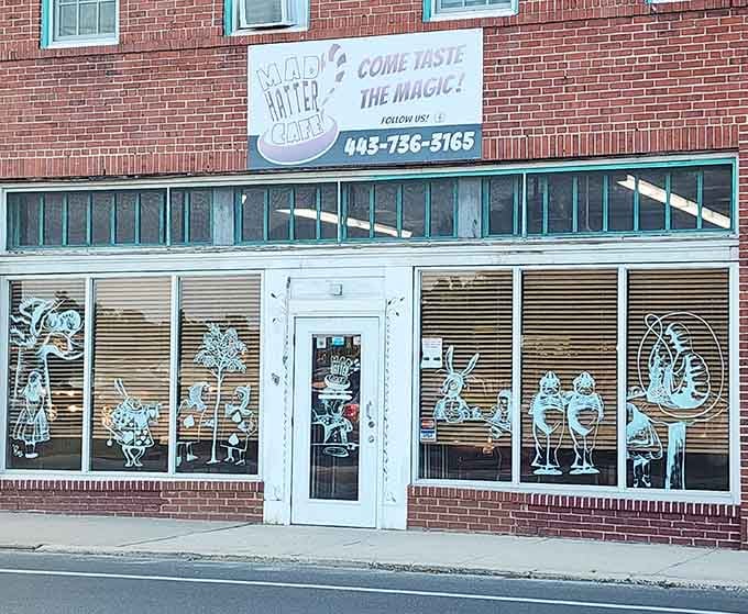 That turquoise awning and those whimsical window silhouettes aren't just decoration&mdash;they're your invitation to Wonderland on West Main Street.