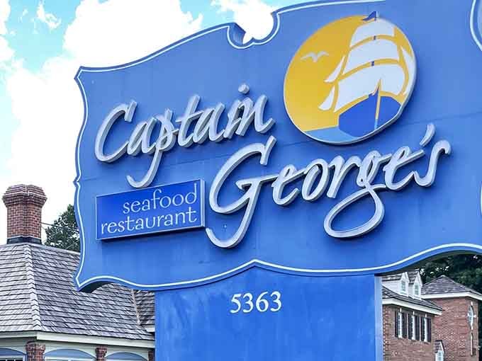 That bright blue sign isn't just calling you in, it's practically demanding you answer the seafood siren's song.