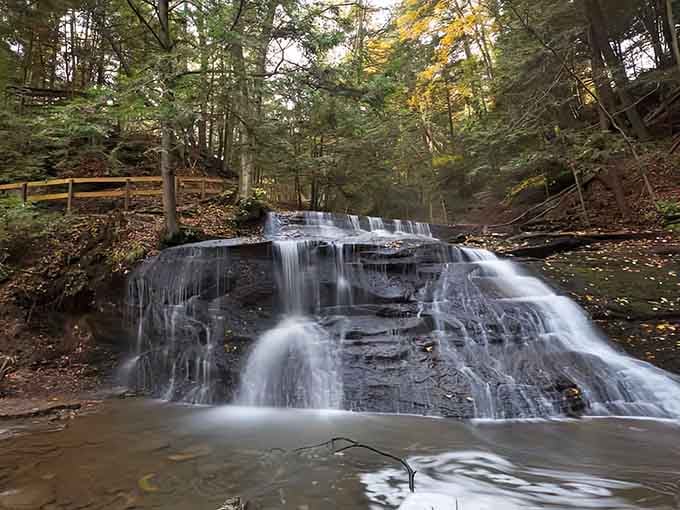 Nature's own masterpiece, cascading in perfect tiers like a wedding cake made of pure liquid magic.