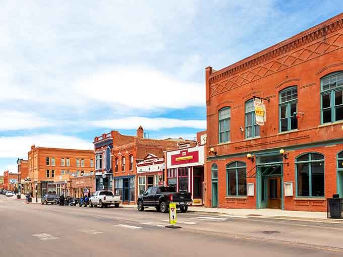 Bennett Avenue stretches before you like a time machine with a gambling problem and excellent mountain views.