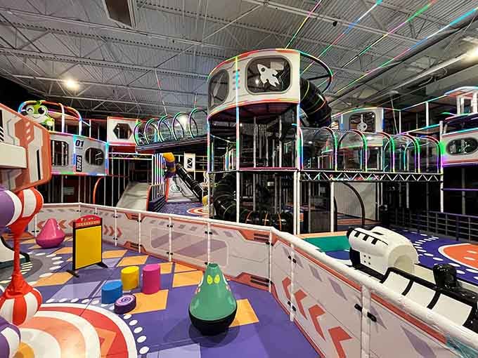 The toddler zone proves that even the smallest adventurers deserve their own space-age exploration station complete with colorful obstacles.