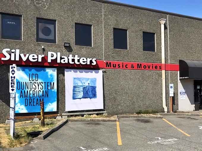 The bold signage and rotating album displays announce this isn't just a store, it's a destination for serious music enthusiasts.