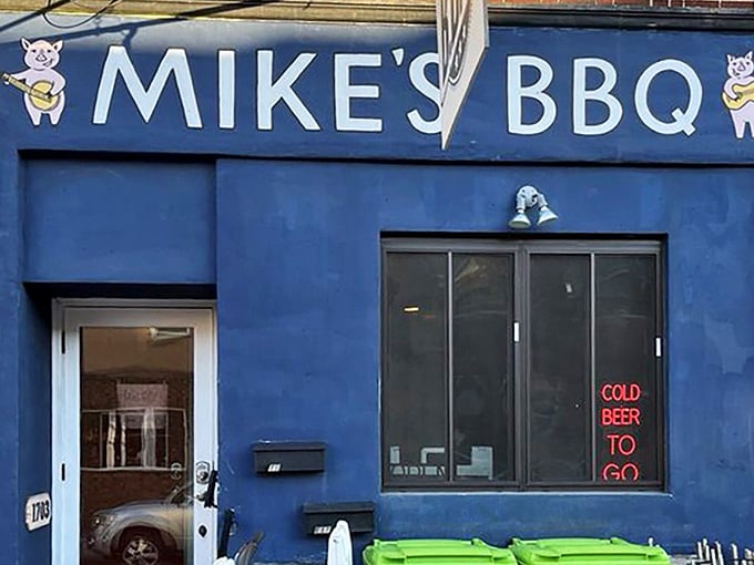 That brilliant blue facade isn't just eye-catching—it's a beacon calling barbecue lovers home to South Street's smokiest sanctuary.