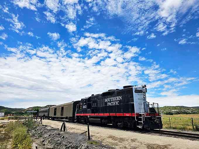 A Southern Pacific locomotive rests against California's endless sky, proving that some things only get better with age and a little TLC.