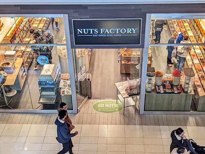 That "Eat Good Feel Good" sign isn't just marketing, it's a promise they're keeping one chocolate bar at a time.