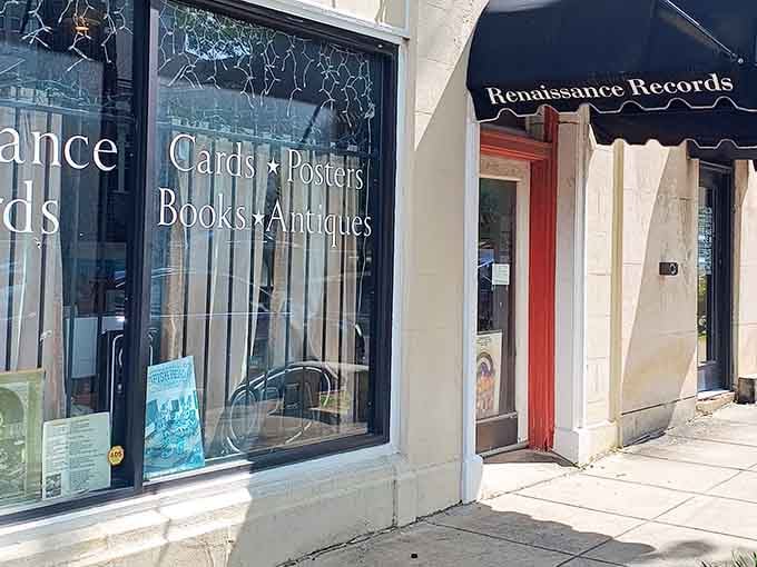 The storefront promises cards, posters, books, and antiques, but let's be honest, you're here for the vinyl treasures inside.