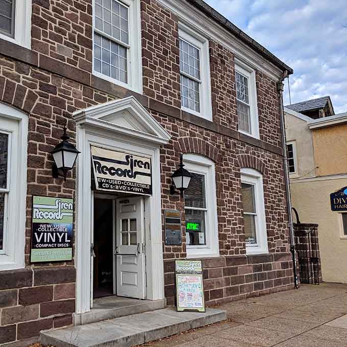That historic brick facade isn't just charming, it's practically begging you to come inside and lose track of time.