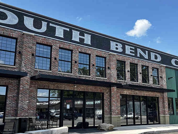 That brick facade announces your destination louder than a dinner bell at suppertime on the farm.