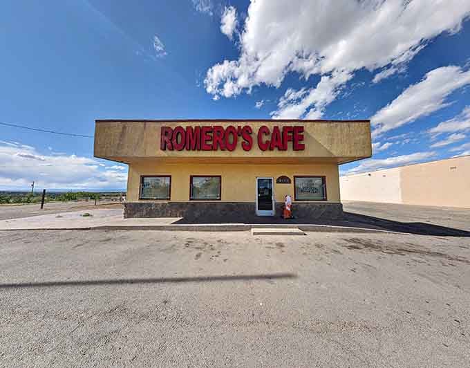 That cheerful yellow building against the big Colorado sky is your destination for green chile glory.