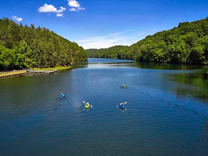 This mirror-smooth lake surrounded by emerald hills proves Kentucky's best secrets are the ones nobody's instagramming yet.