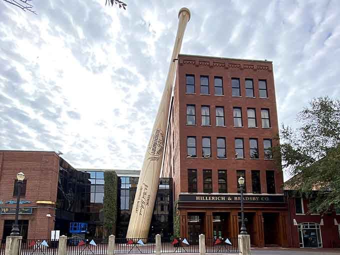 That's not a bat, THIS is a bat: 120 feet of steel painted to look like wood, leaning casually against downtown Louisville.